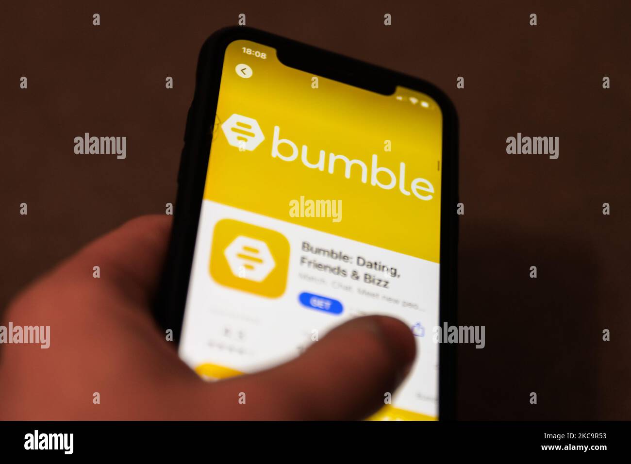 Bumble dating app logo on the App Store is seen displayed on a phone ...