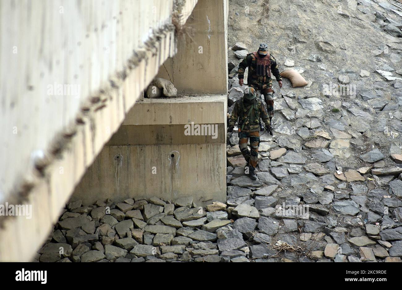 Indian soldiers are seen after an Improvised Explosive Device (IED) was ...