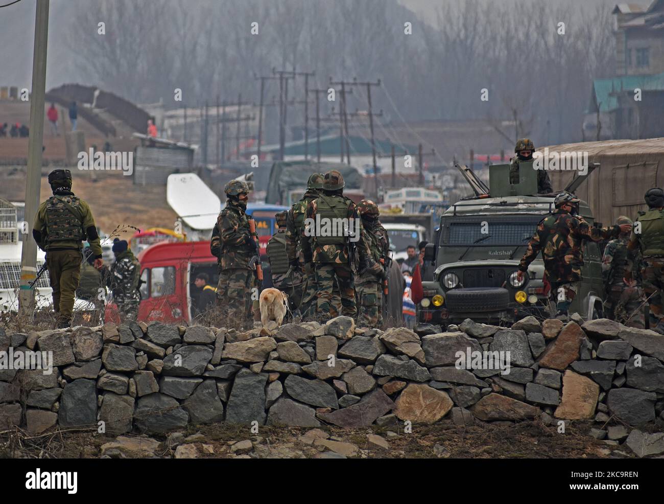 Indian soldiers are seen after an Improvised Explosive Device (IED) was ...