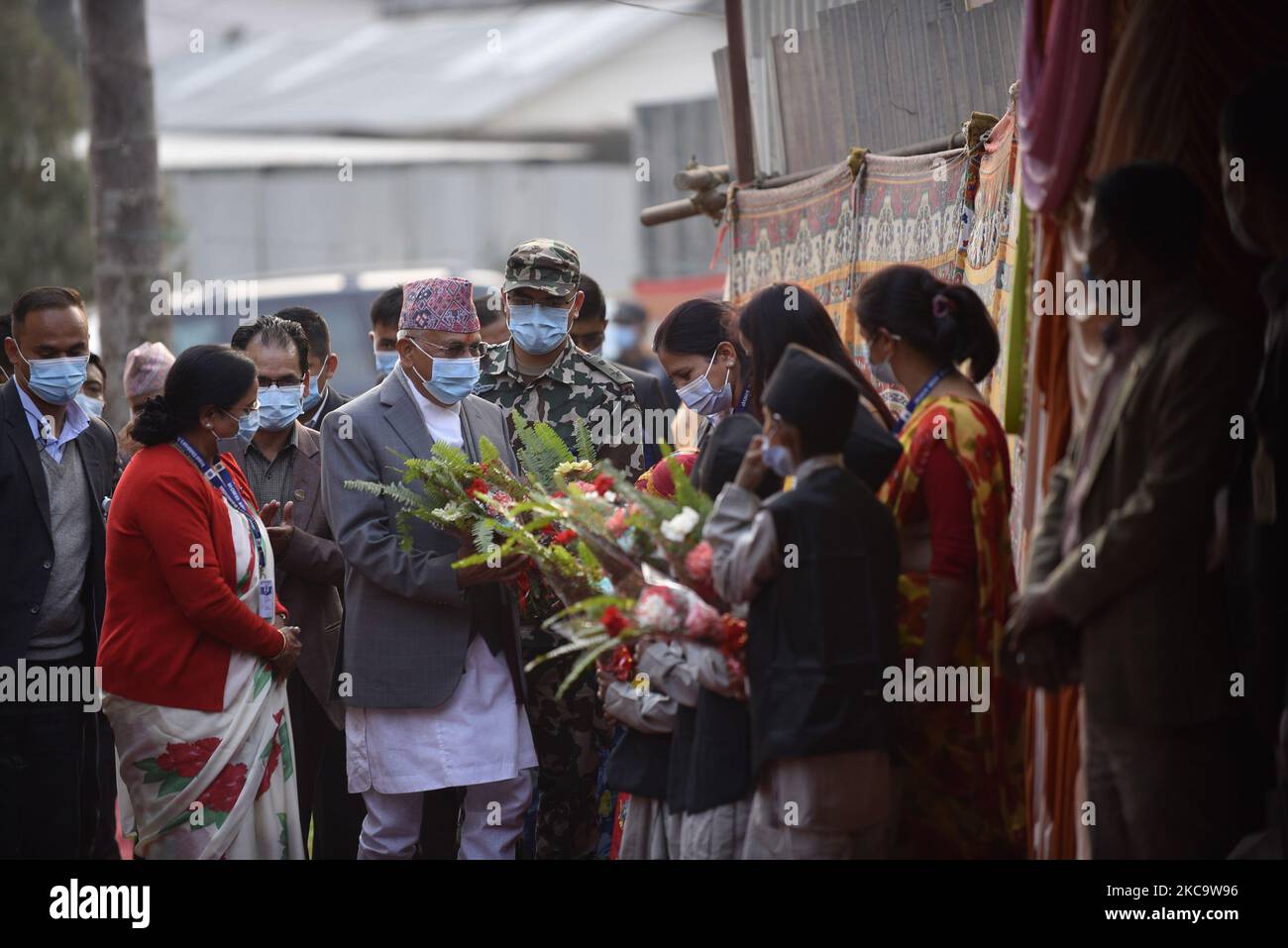 Children in a traditional attire welcome Prime Minister of Nepal KP ...