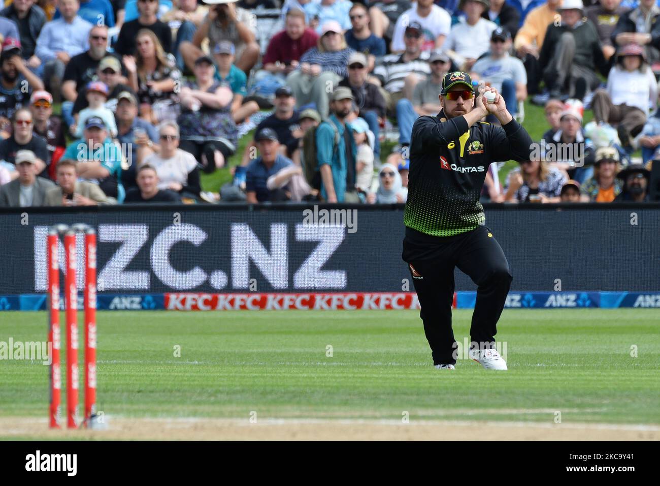 Australia's Aaron Finch successfully catches a ball to dismiss New ...