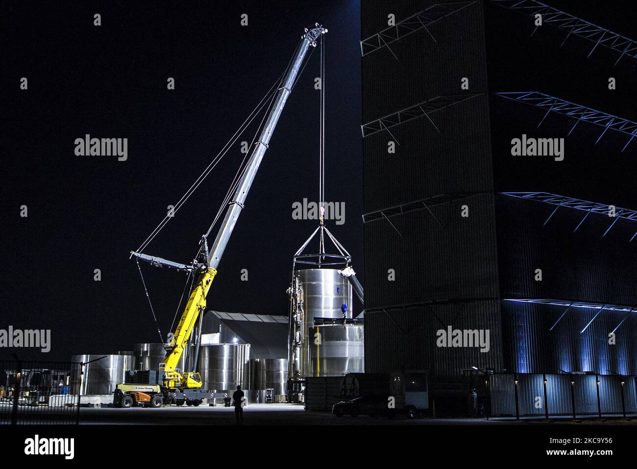 Engineers work into the night dismantling SN-5 and building Super Heavy ...