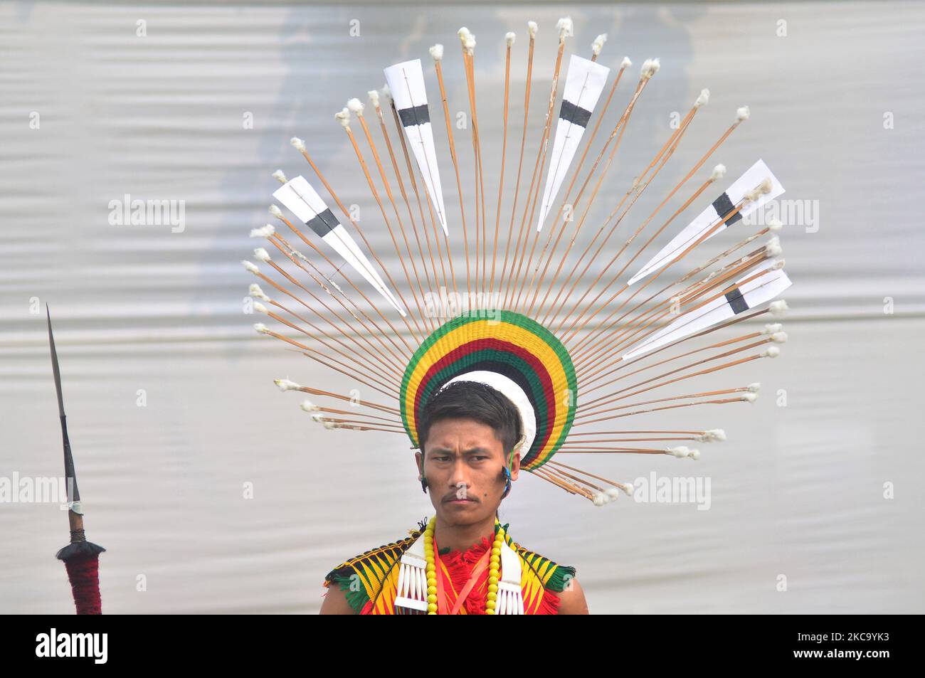 An Angami Naga man in his cultural attires during Sekrenyi Festival at ...