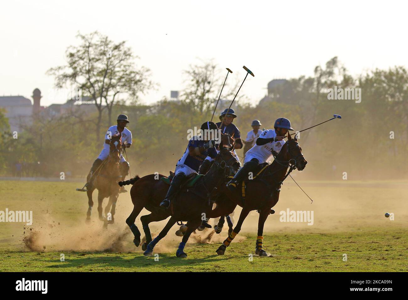 Players of Sujan Polo and Chandna Group teams in action during the ...