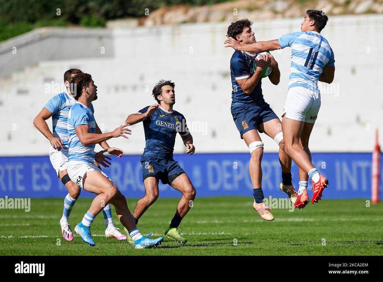 Players In action during the Madrid Rugby 7s match between Spain and ...