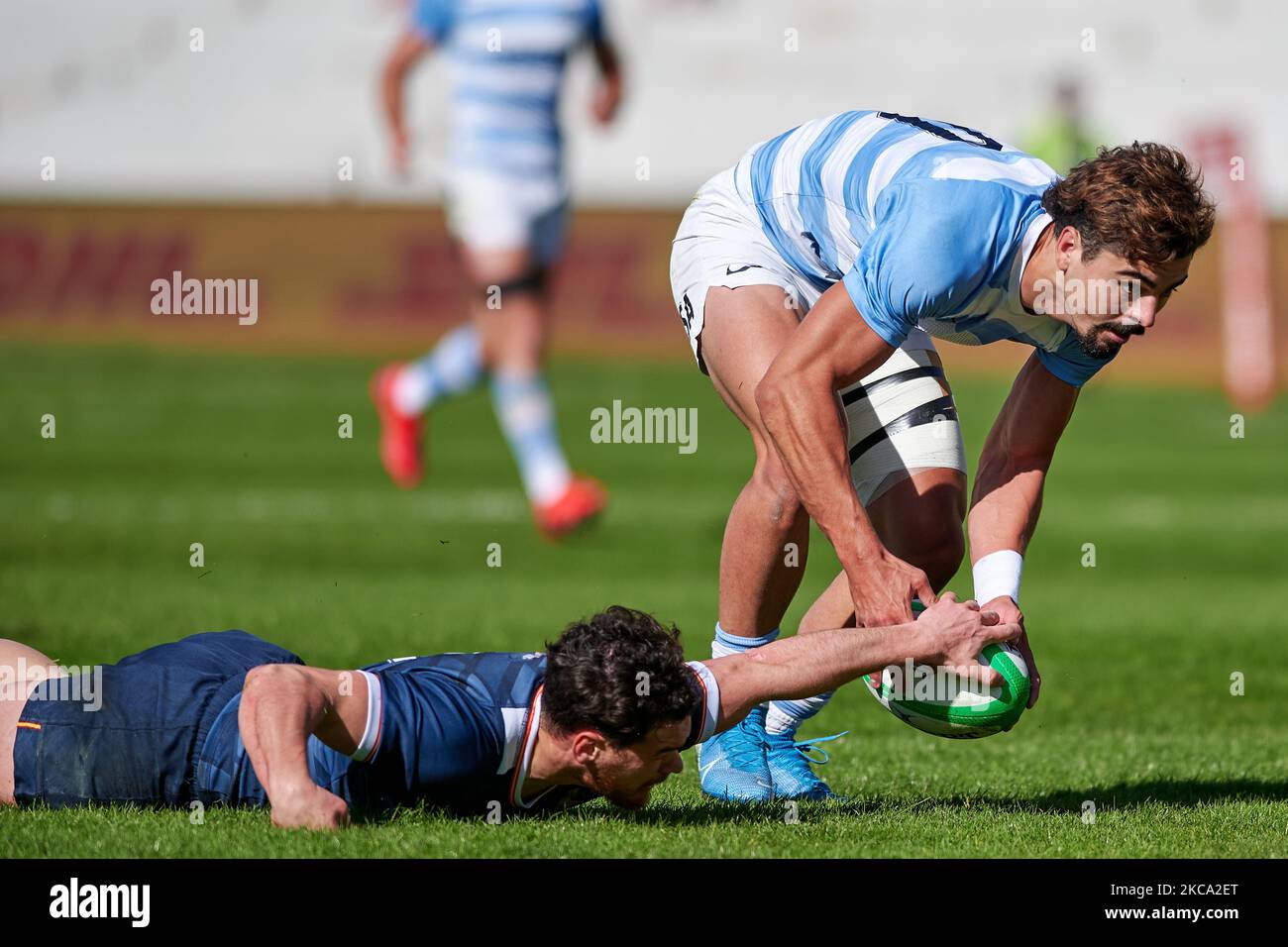 Players In action during the Madrid Rugby 7s match between Spain and ...