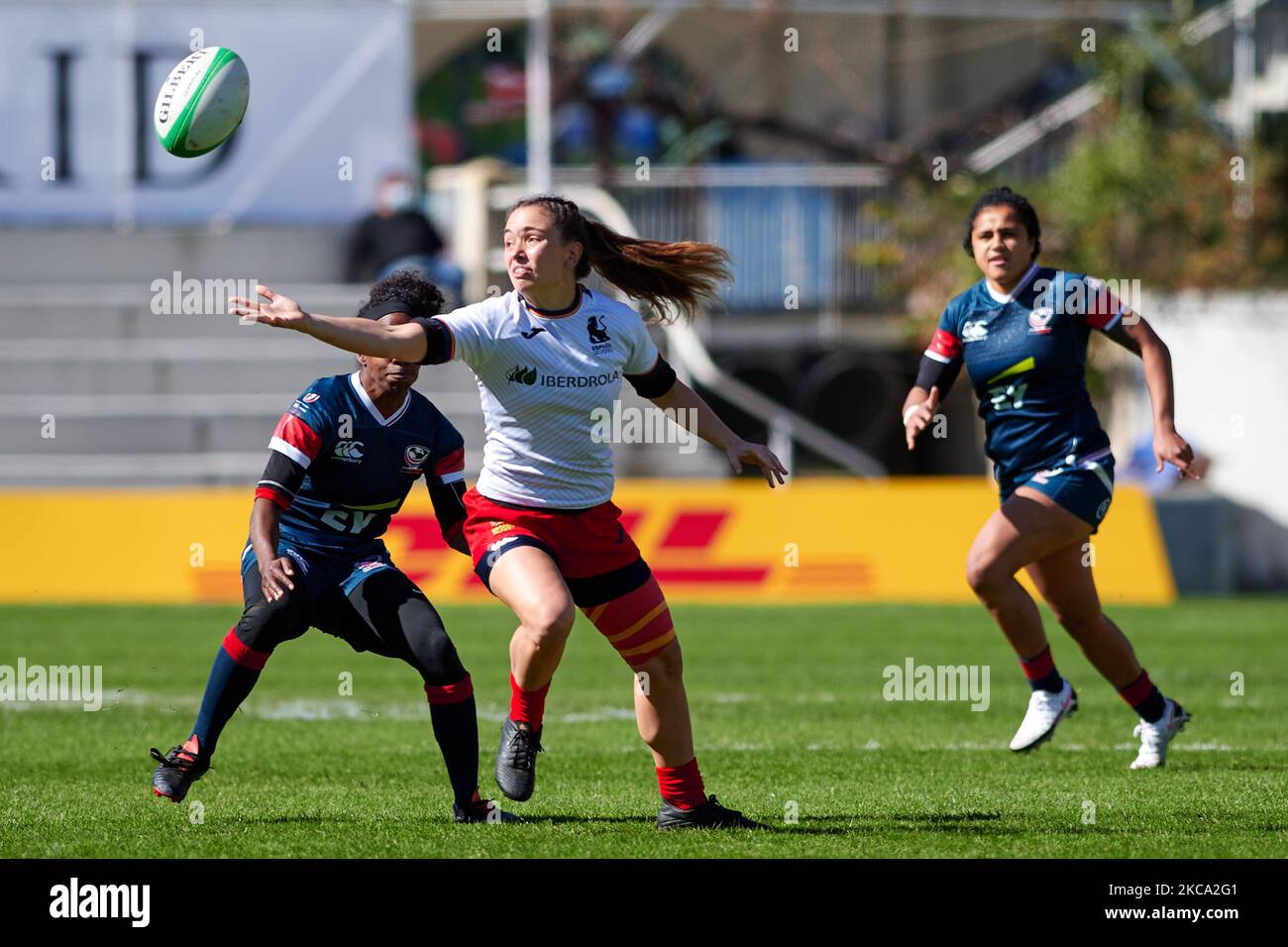Players In action during the Madrid Rugby 7s match between Spain and ...