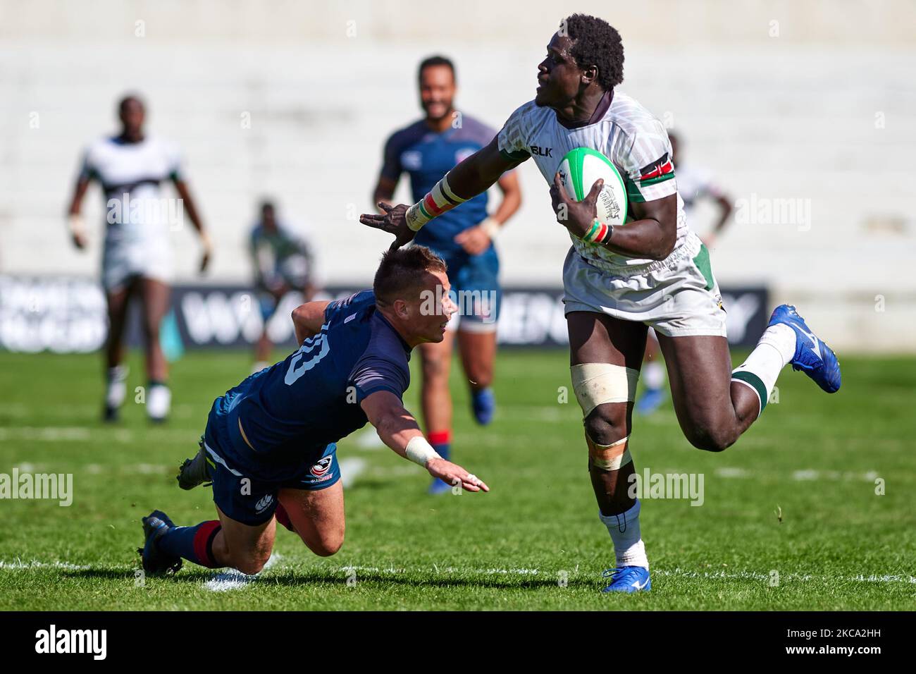 Players In action during the Madrid Rugby 7s match between Kenya and ...