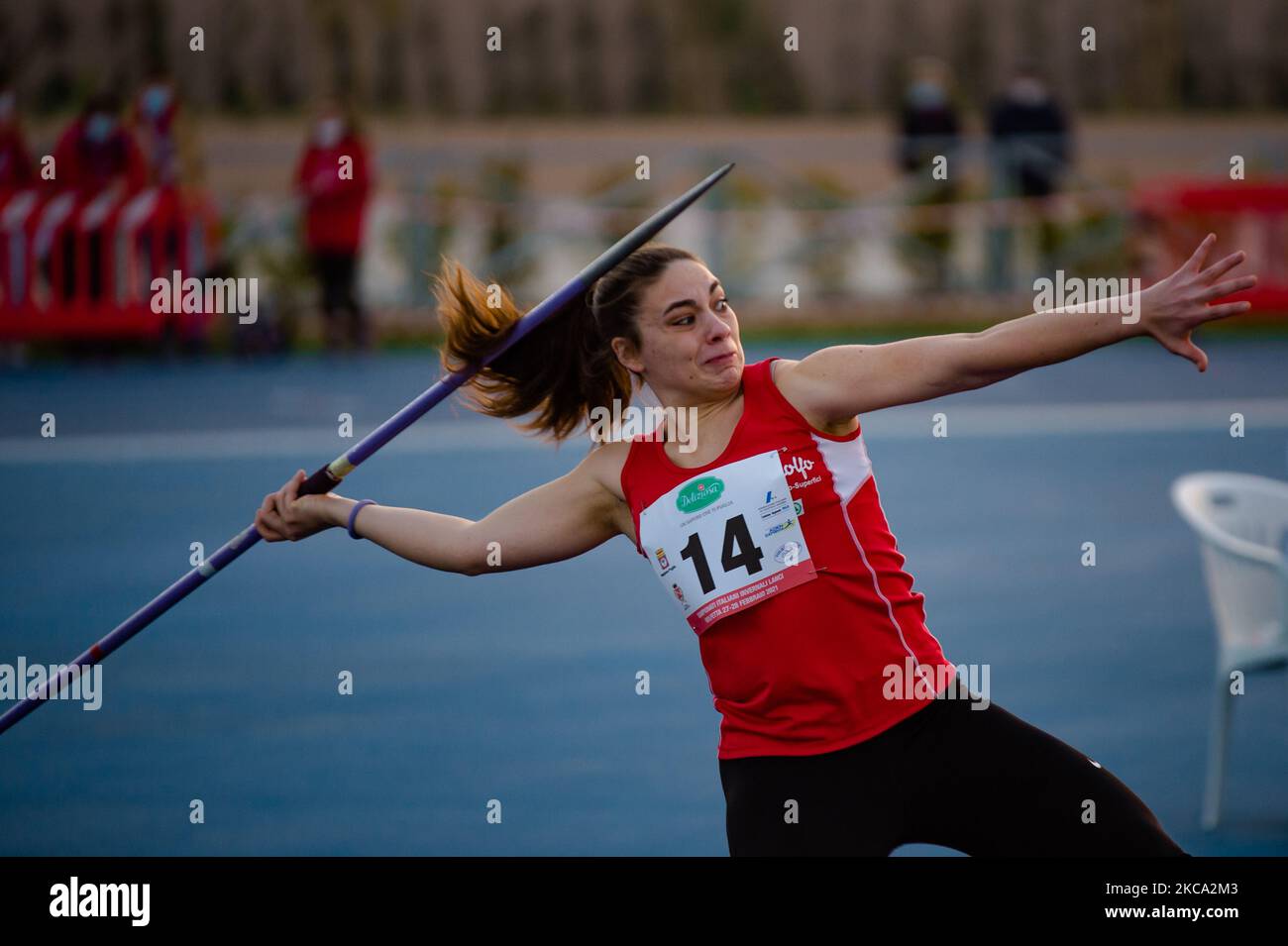 An athlete competing at the javelin throw during the Italian Winter ...