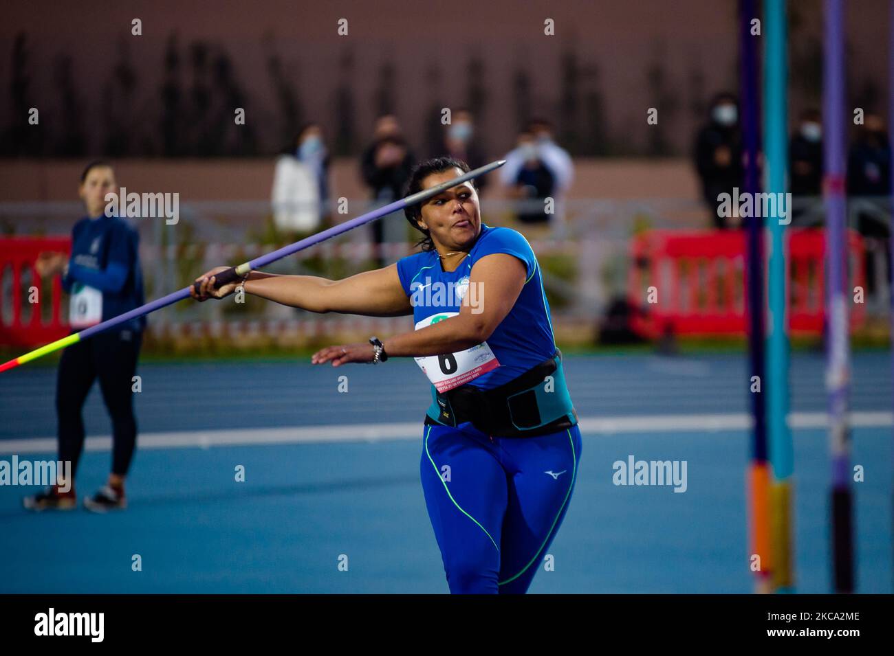 An athlete competing at the javelin throw during the Italian Winter ...