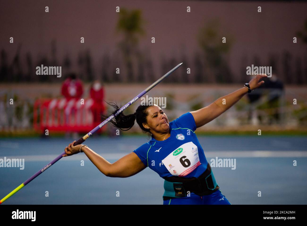 An athlete competing at the javelin throw during the Italian Winter ...