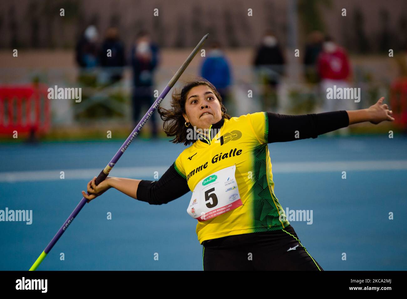 An athlete competing at the javelin throw during the Italian Winter ...