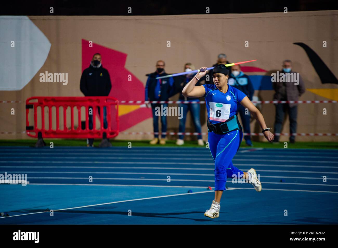 An athlete competing at the javelin throw during the Italian Winter ...