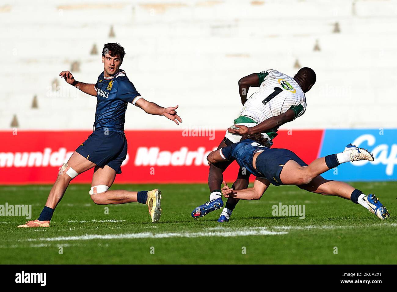 Players In action during the Madrid Rugby 7s match between Spain and ...