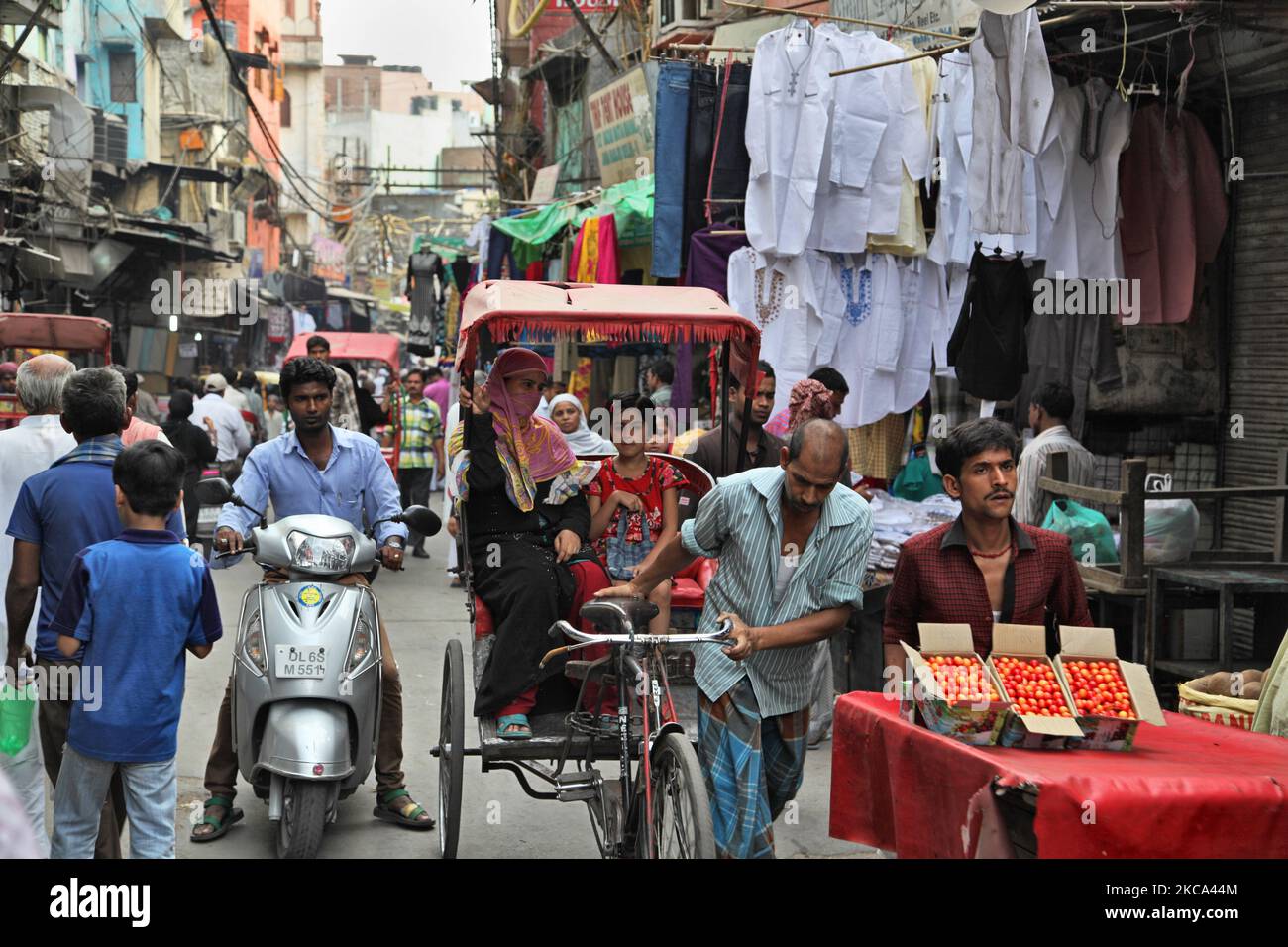 Crowded street at a market near the Jamia Masjid in Old Delhi, India ...