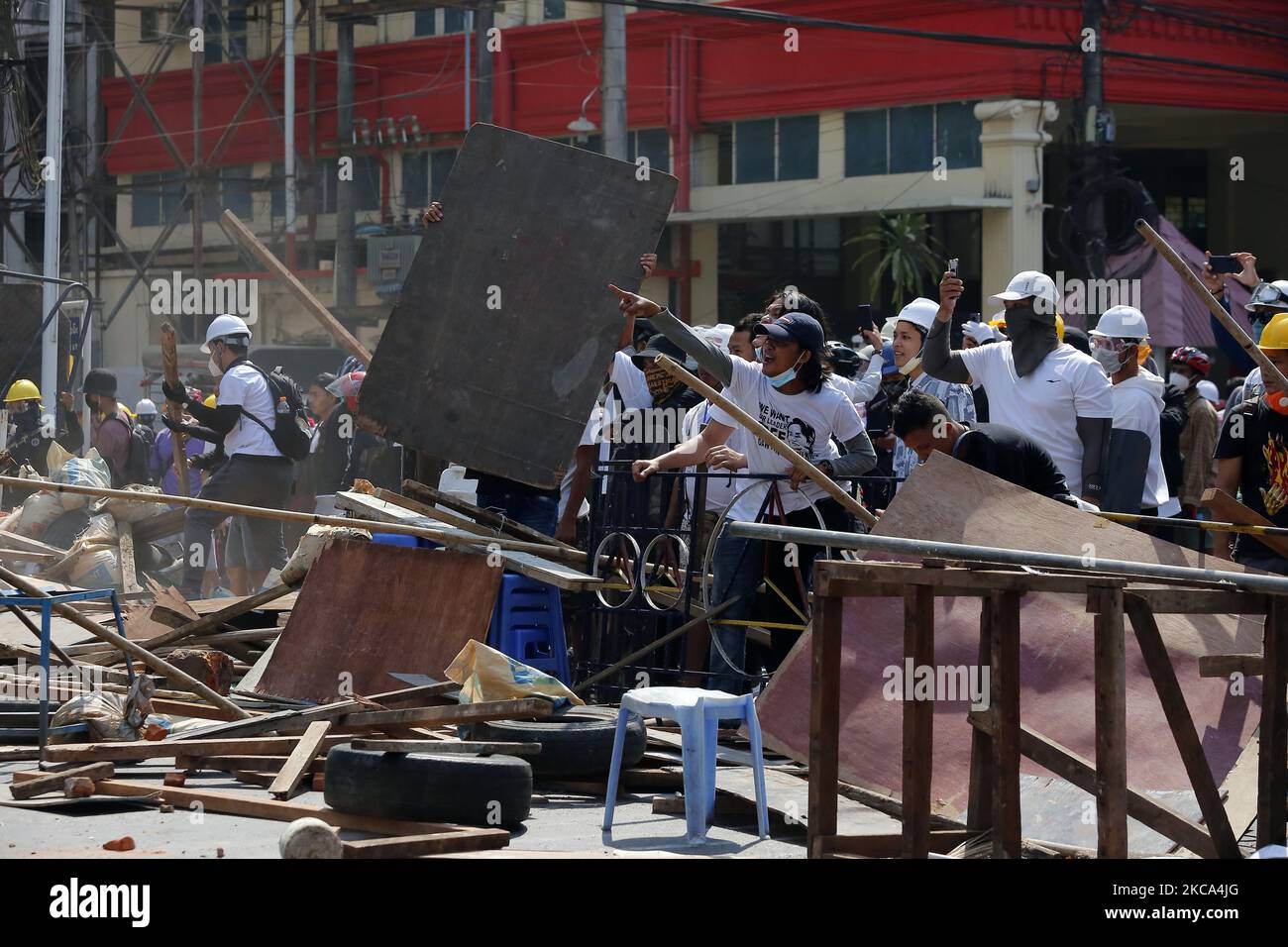 Protesters block a street during a violent crackdown on demonstrations ...