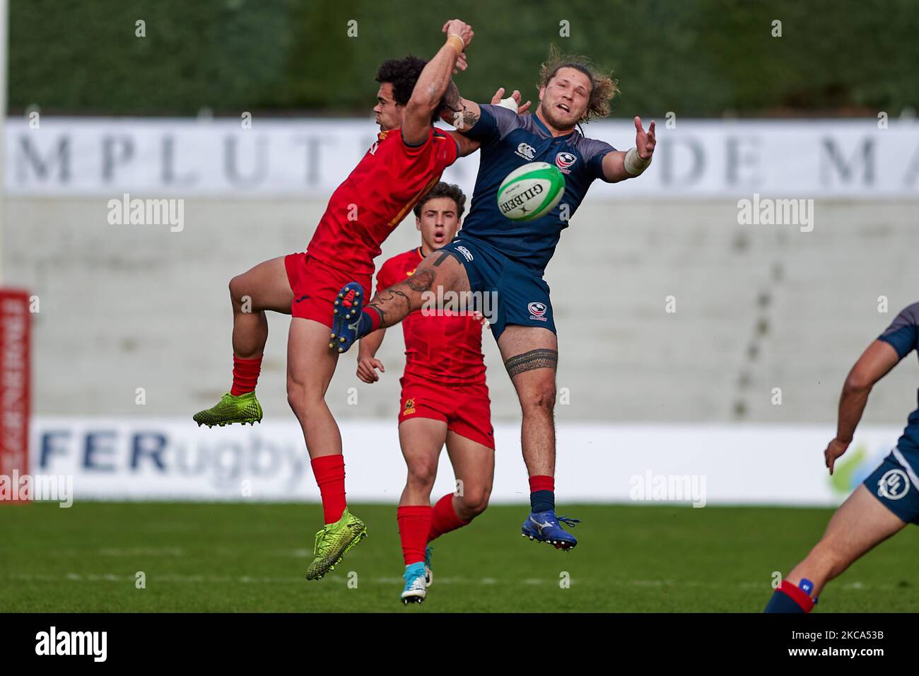 Players In action during the Madrid Rugby 7s match between Spain and ...