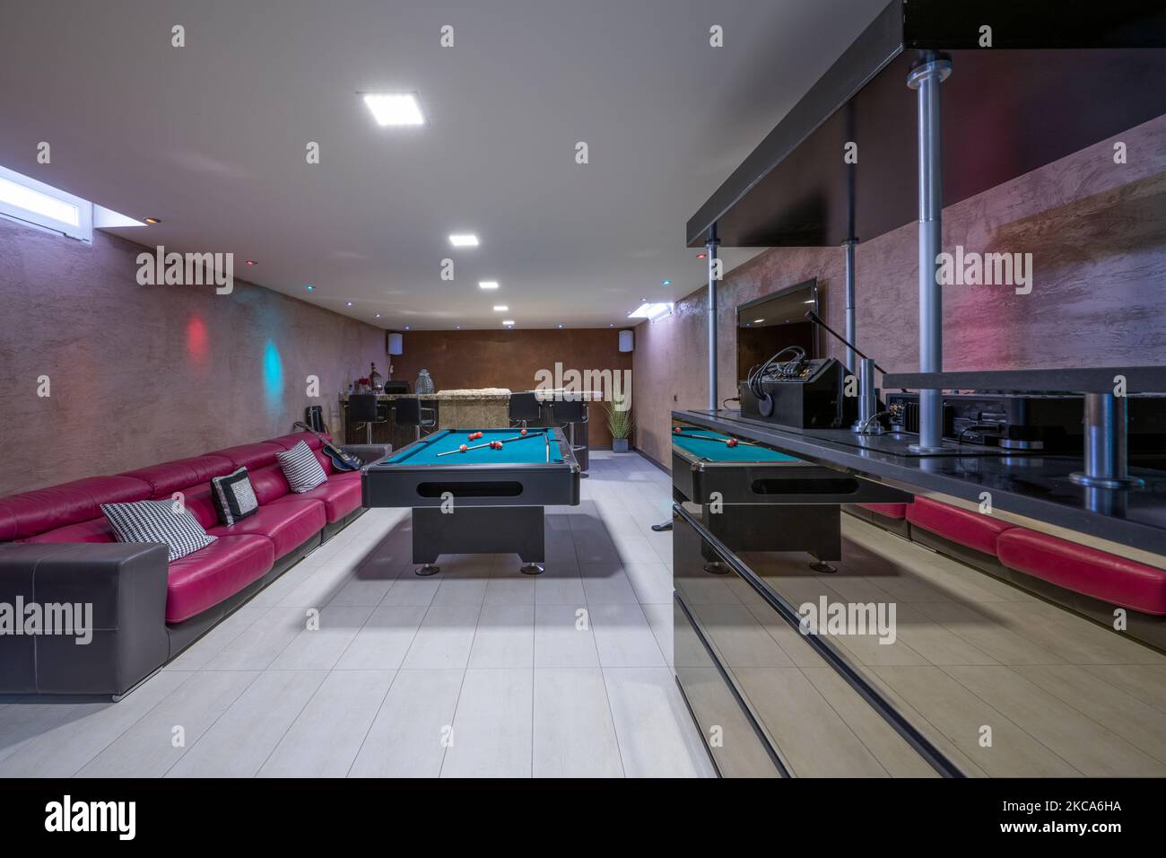 Games room and music room on the ground floor of a single-family home ...