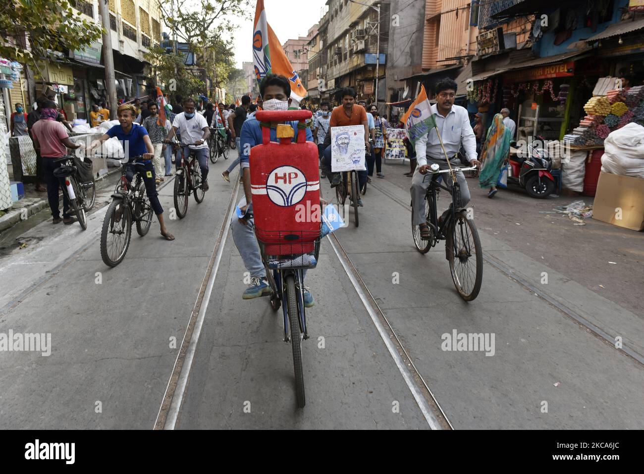 Cycle rally by Trinamool Congress activists to protest against the hike ...