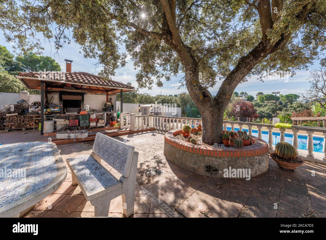 Courtyard on the grounds of a single-family home with a swimming pool ...