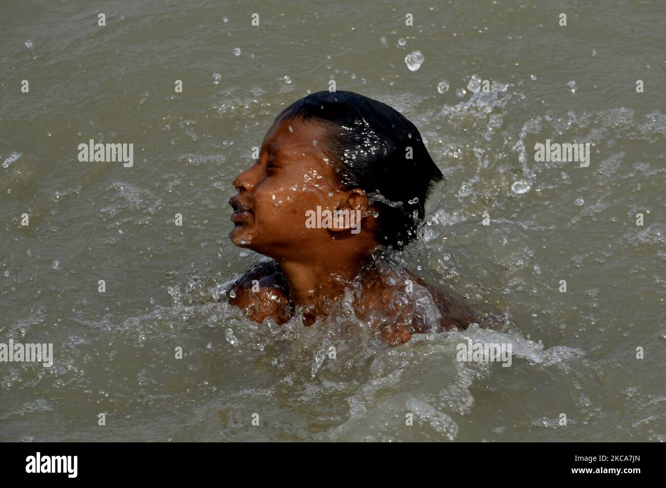 A boy takes a bath on the river Ganga in Kolkata, India, 02 March, 2021 ...