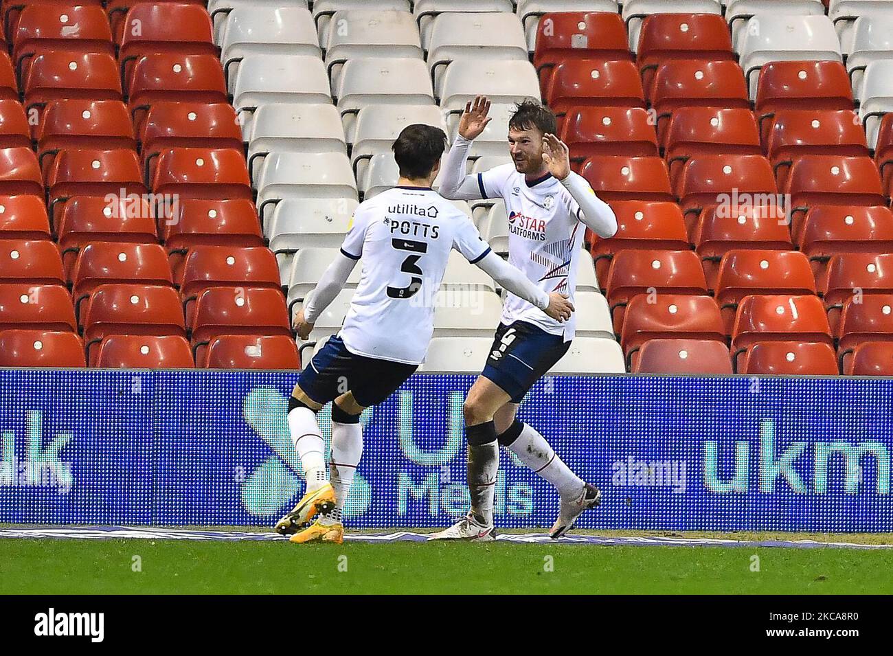 Ryan Tunnicliffe of Luton Town celebrates with Dan Potts of Luton Town ...