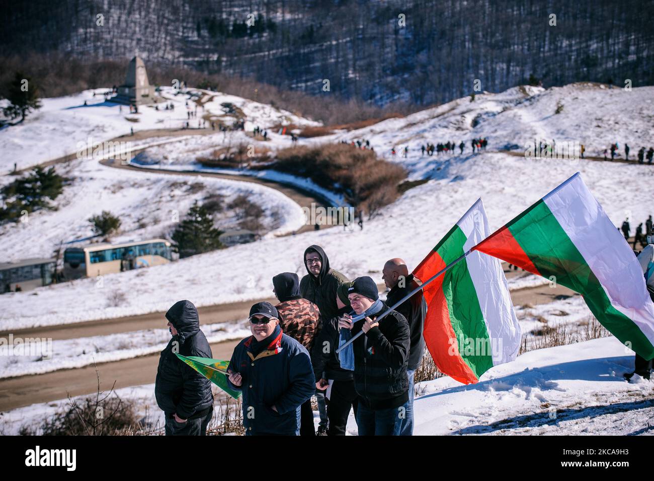 People wave Bulgarian flags during celebrations of the National Holiday ...