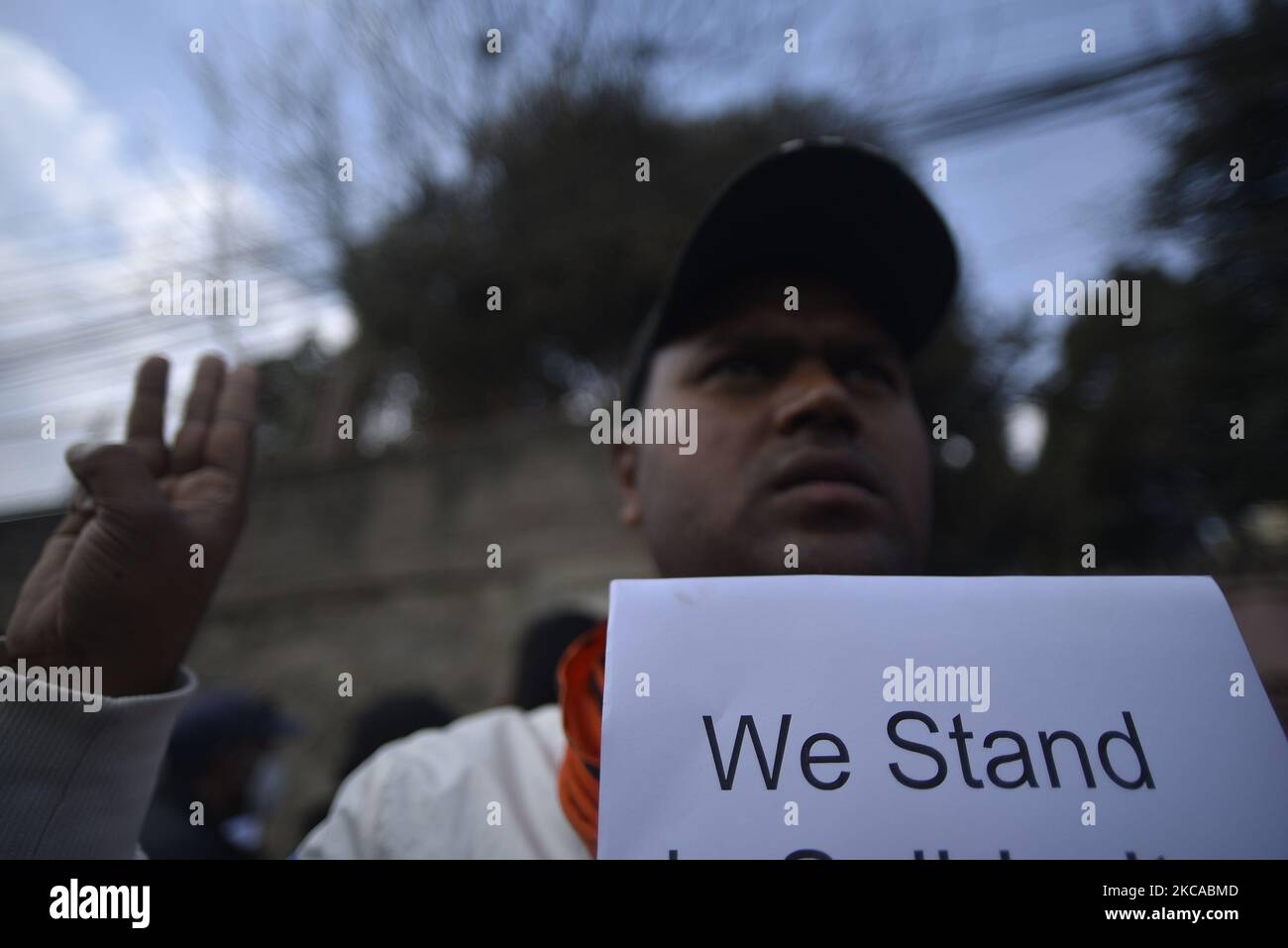 Three fingered defiance salute hi-res stock photography and images - Alamy