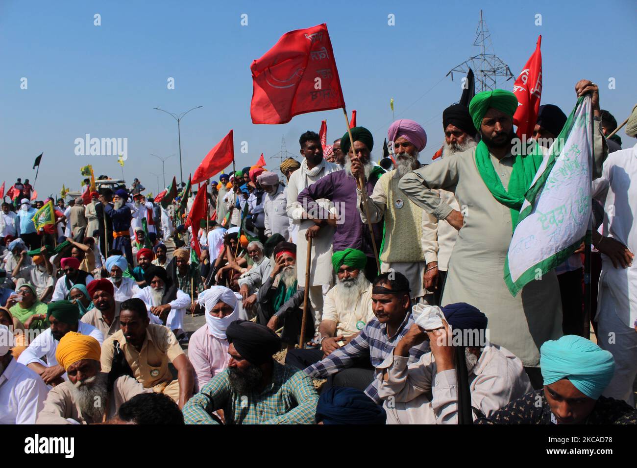 Farmers take part in a protest by blocking KMP expressway to mark 100 ...