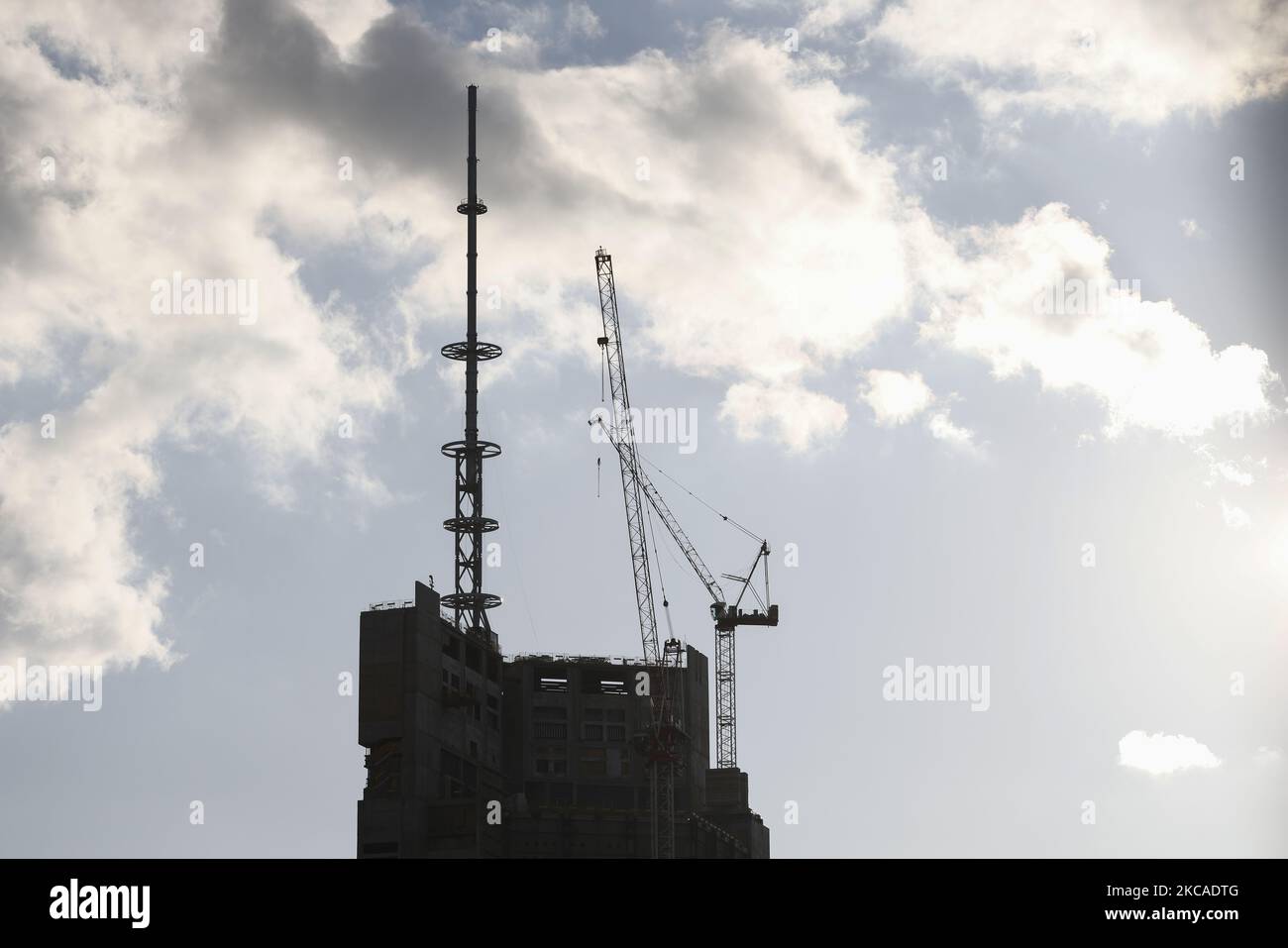 The recently installed spire is seen on the Varso tower in Warsaw ...