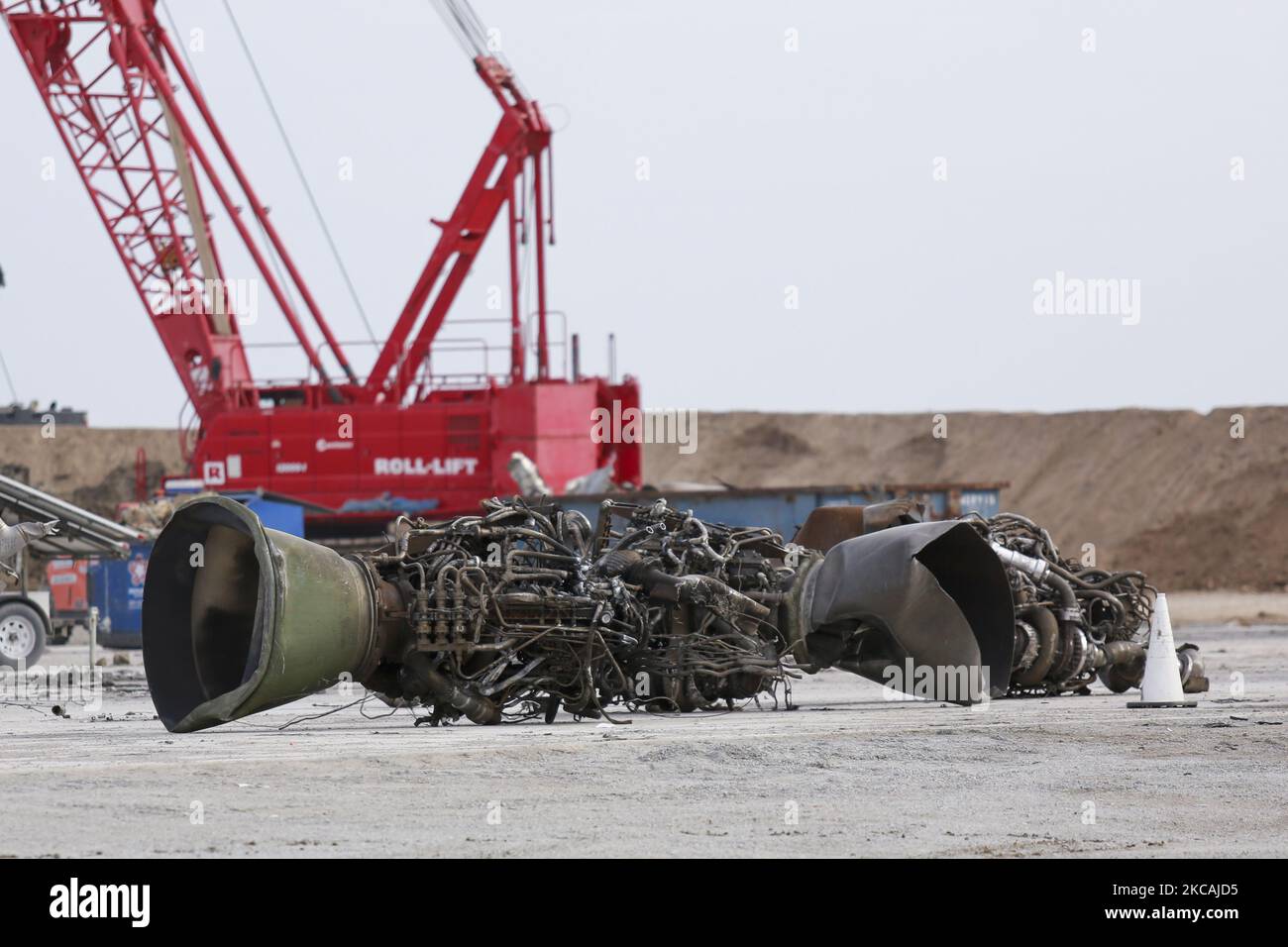 The destroyed Raptor engine from Starship SN-10’s wreckage rests near ...