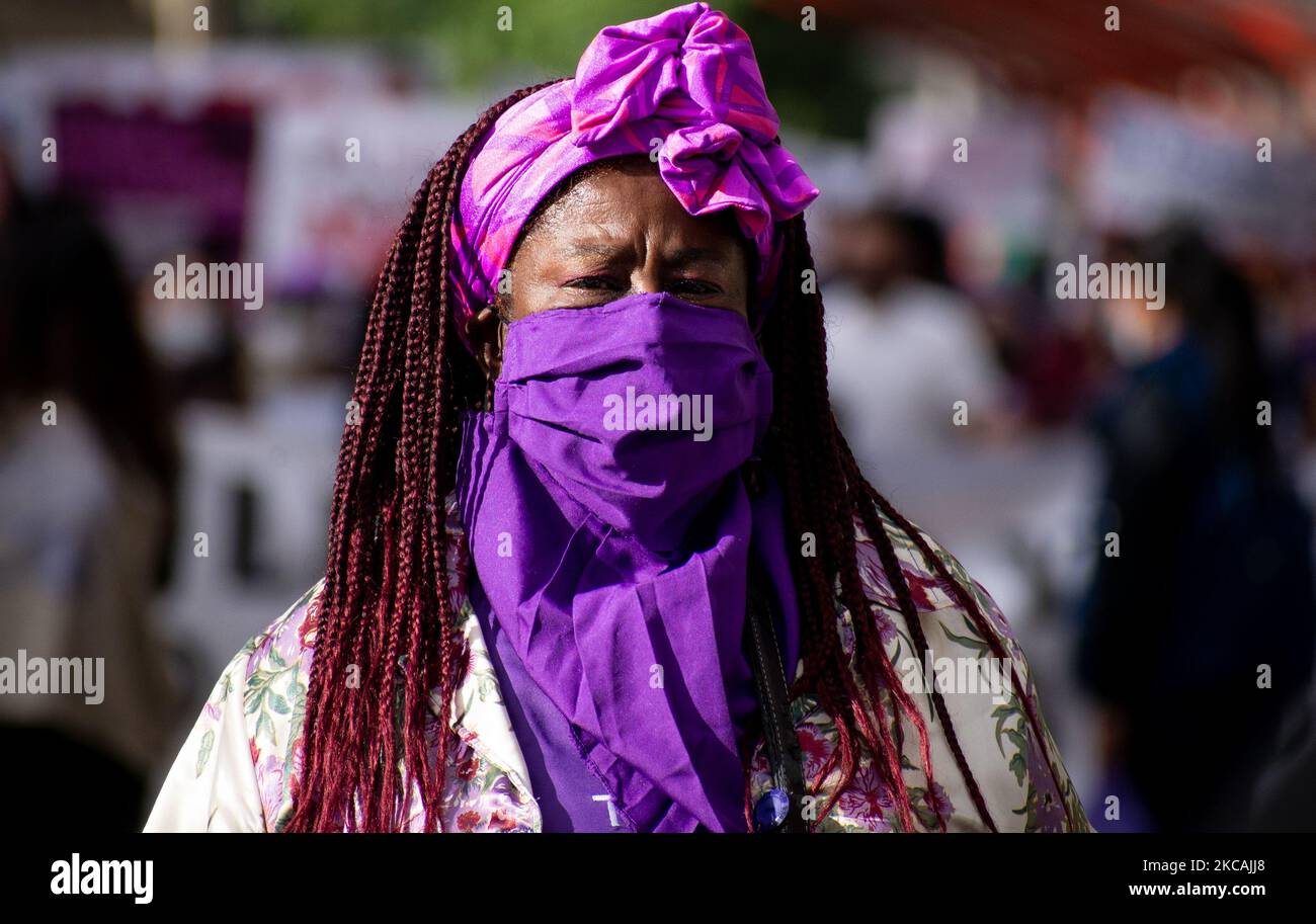 Women take port in the International Women's Day, in Bogota, Colombia ...