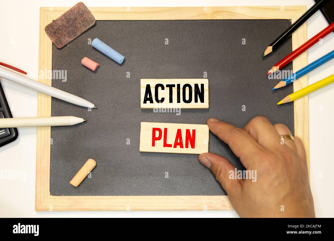 action plan text on notebook with stationery on wooden desk Stock Photo ...
