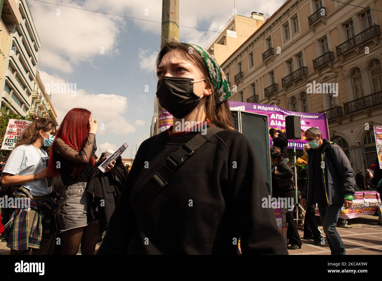 Athens, Greece, March 8th, 2021 - A young woman at the protest for the ...