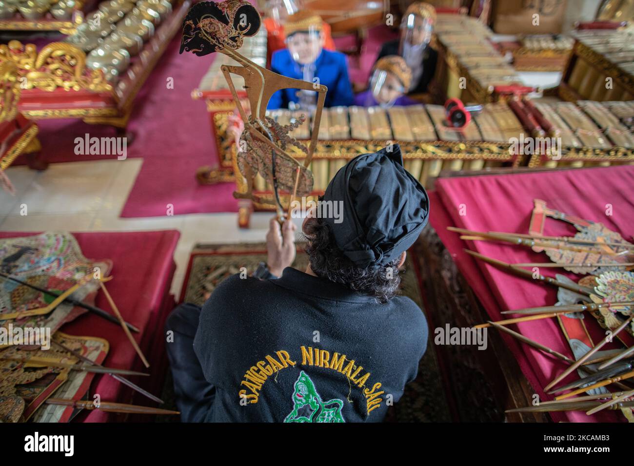 Children learn and practice puppets at the Nirmala Sari shadow puppet ...
