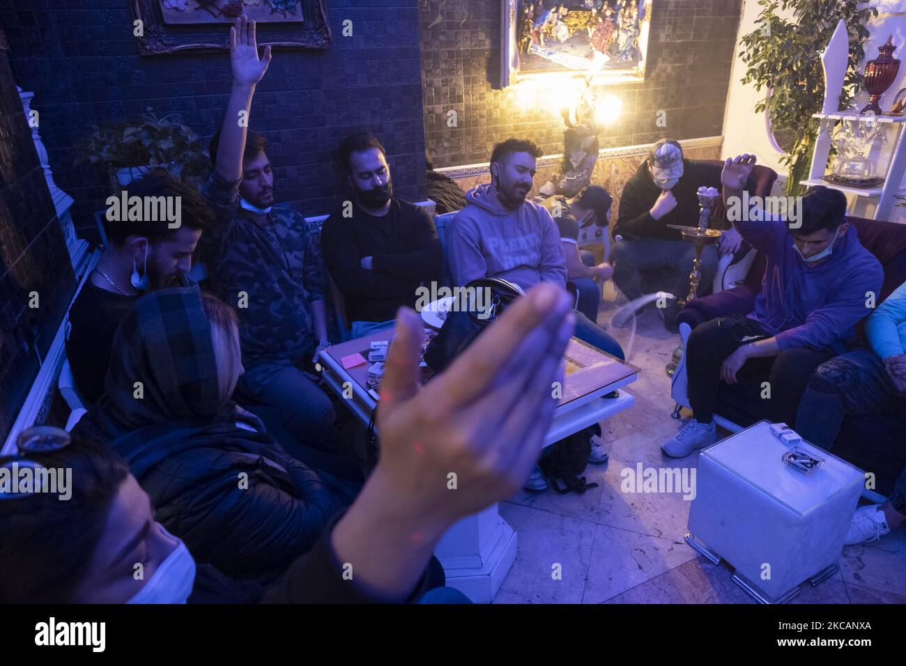 Iranian players vote in a Game of Mafia, also known as Werewolf that is ...