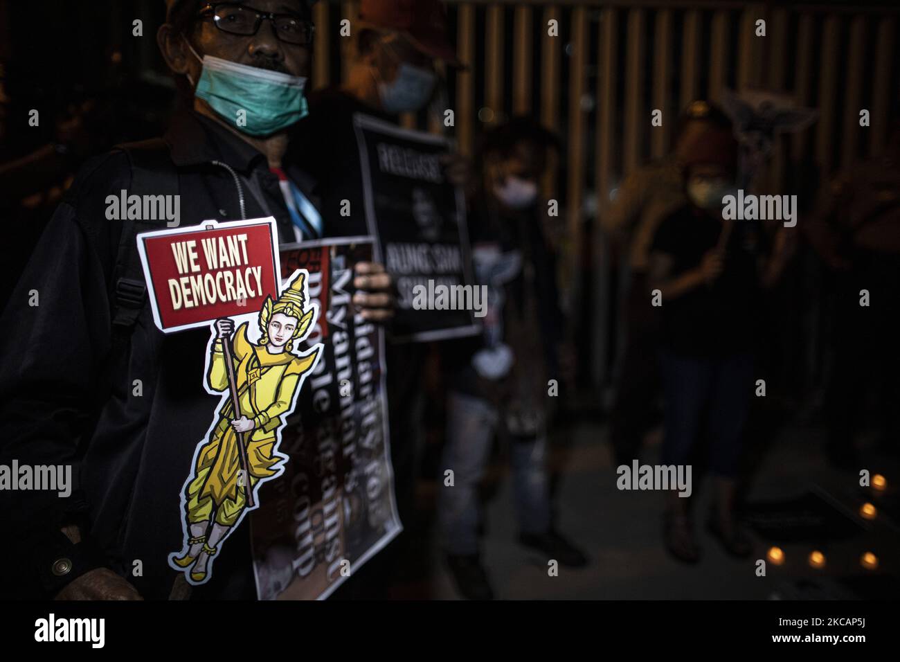Activists held a candle protest in front ASEAN Building Jakarta ...