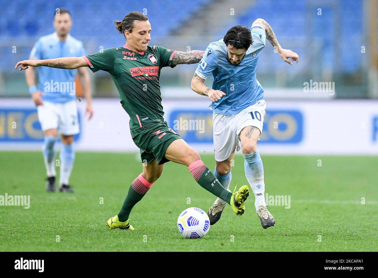 Luis Alberto of SS Lazio and Jacopo Petriccione of FC Crotone compete ...