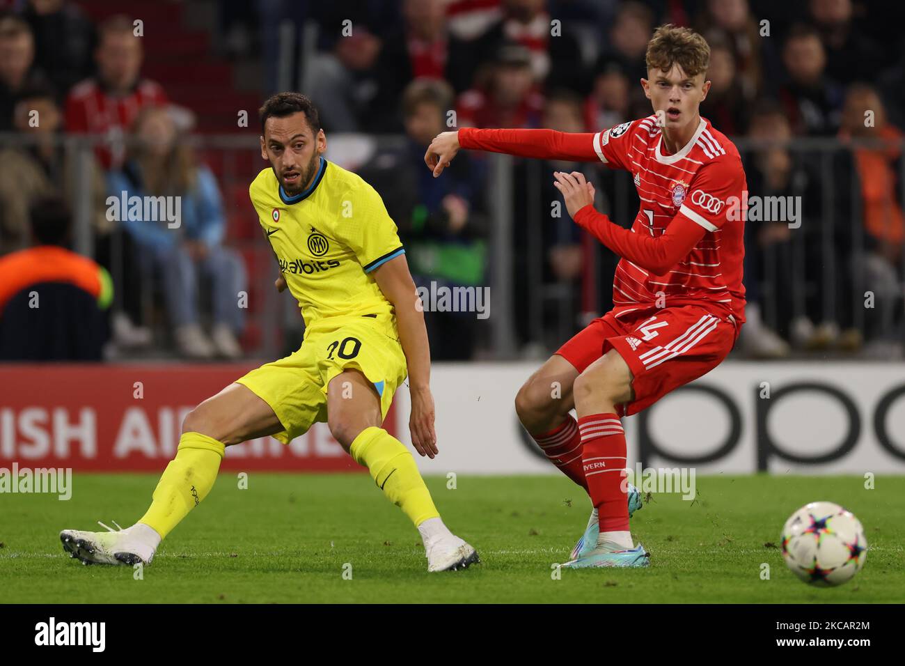Munich, Germany, 1st November 2022. Hakan Calhanoglu of FC Internazionale plays the ball as Paul ...