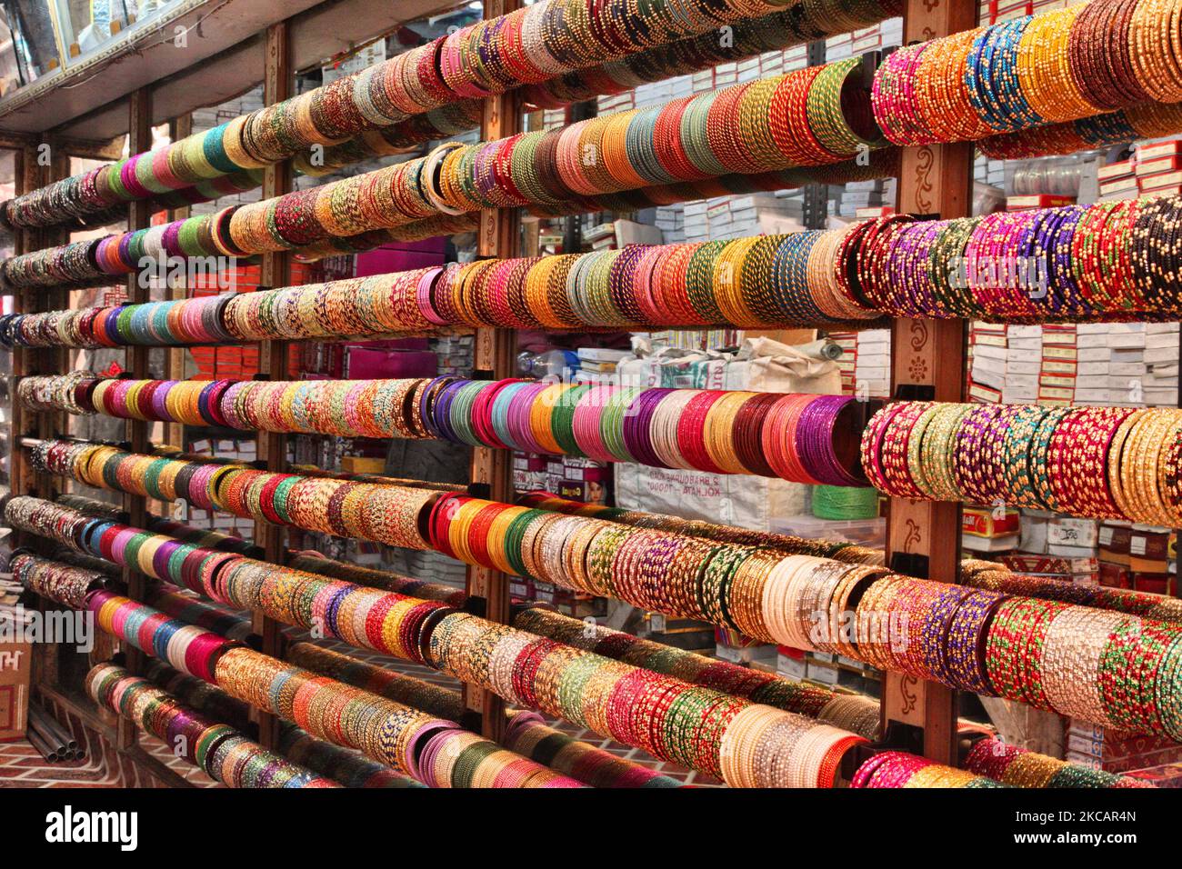Colourful glass bangles displayed at a shop in the bangle market at Ballimaran in Old Delhi ...