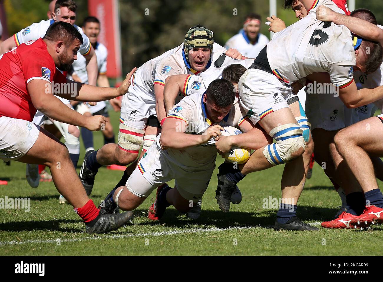 Portugal's and Romania's players compete during the Rugby Europe ...
