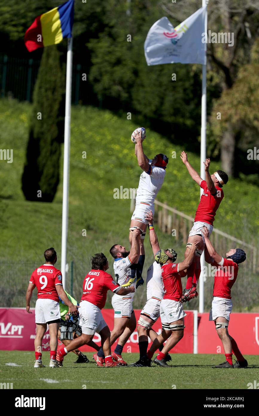 Portugal's and Romania's players compete during the Rugby Europe ...