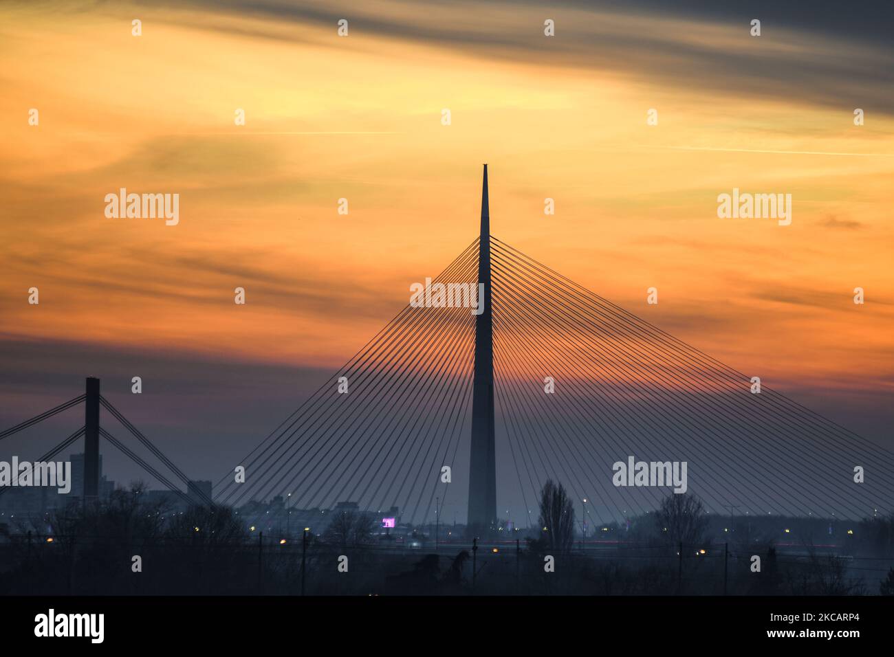 Sunset in Belgrade: Ada Bridge. Serbia Stock Photo - Alamy