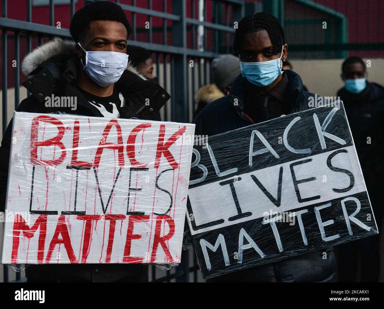 Young men with blm posters hi-res stock photography and images - Alamy