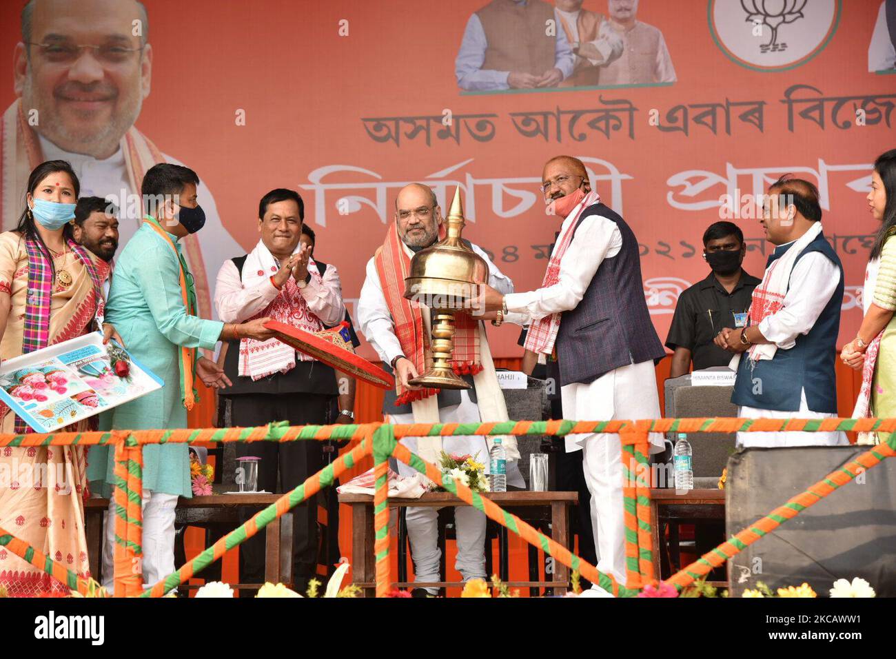 India'sÂ Home Minister Amit Shah being presented an 'Assamese Japi ...