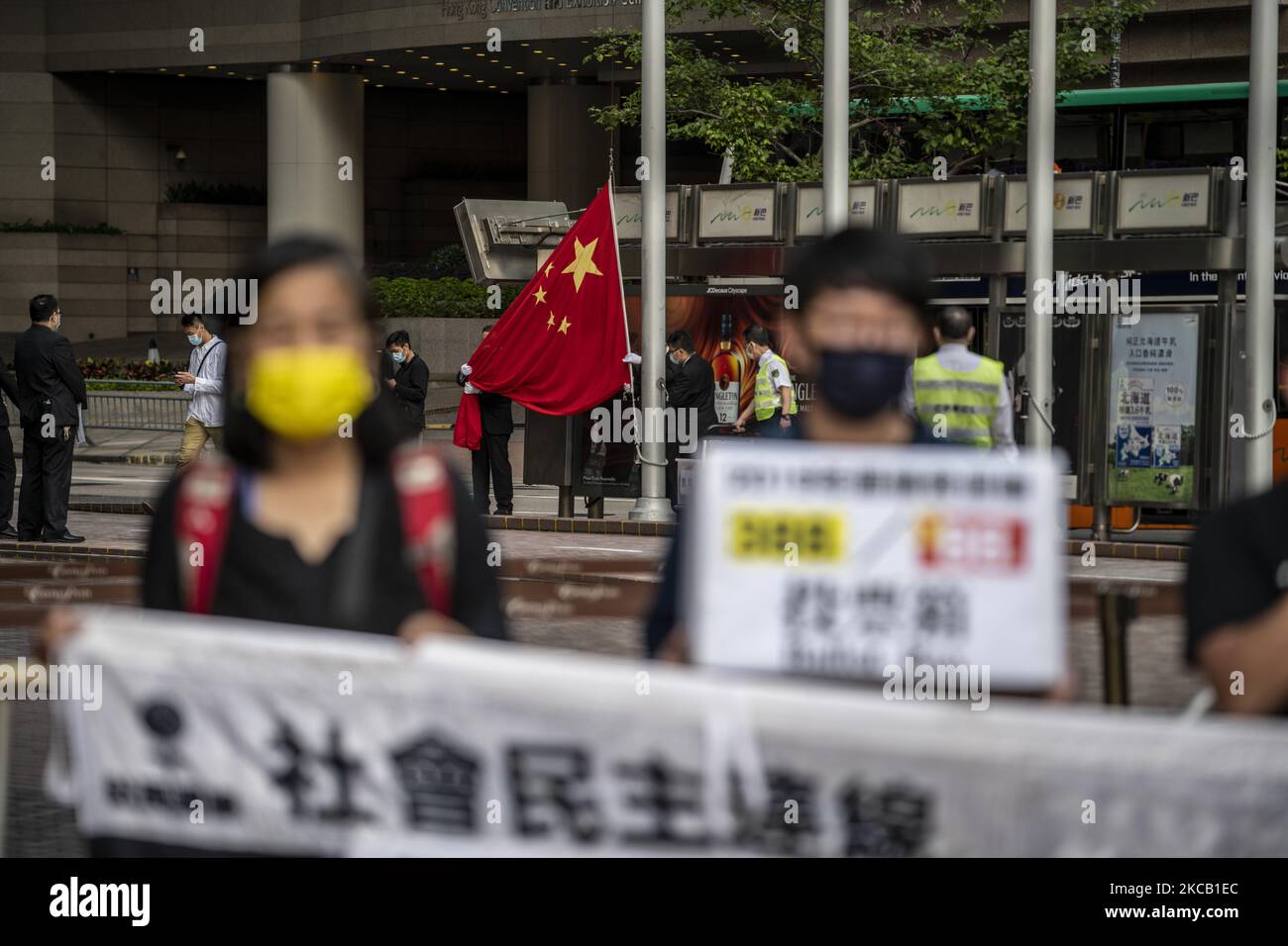 The National Flag of the People's Republic of China is being raised ...