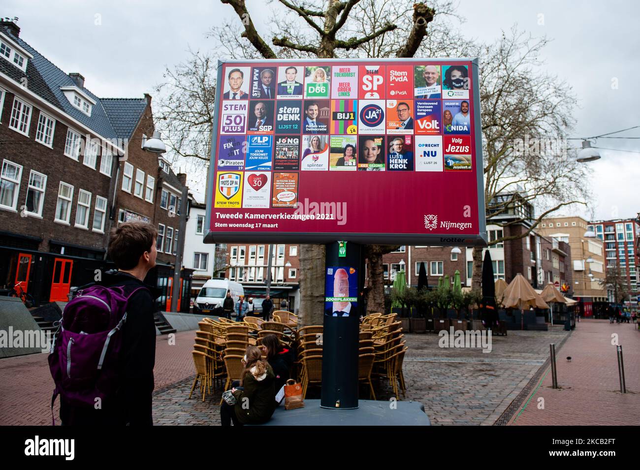 A big billboard with all the political parties is placed in the center ...
