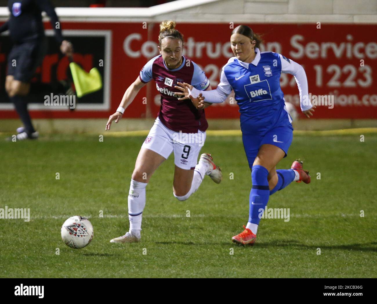 L-R Martha Thomas of West Ham United WFC takes on Ruby Mace of ...