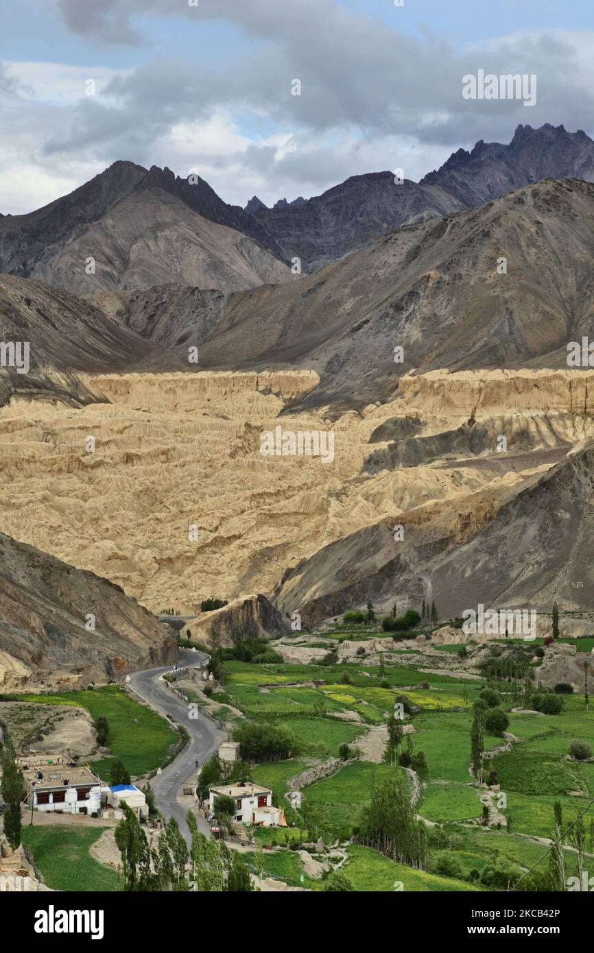 Mountains surround the remote Lamayuru village in Lamayuru, Ladakh ...
