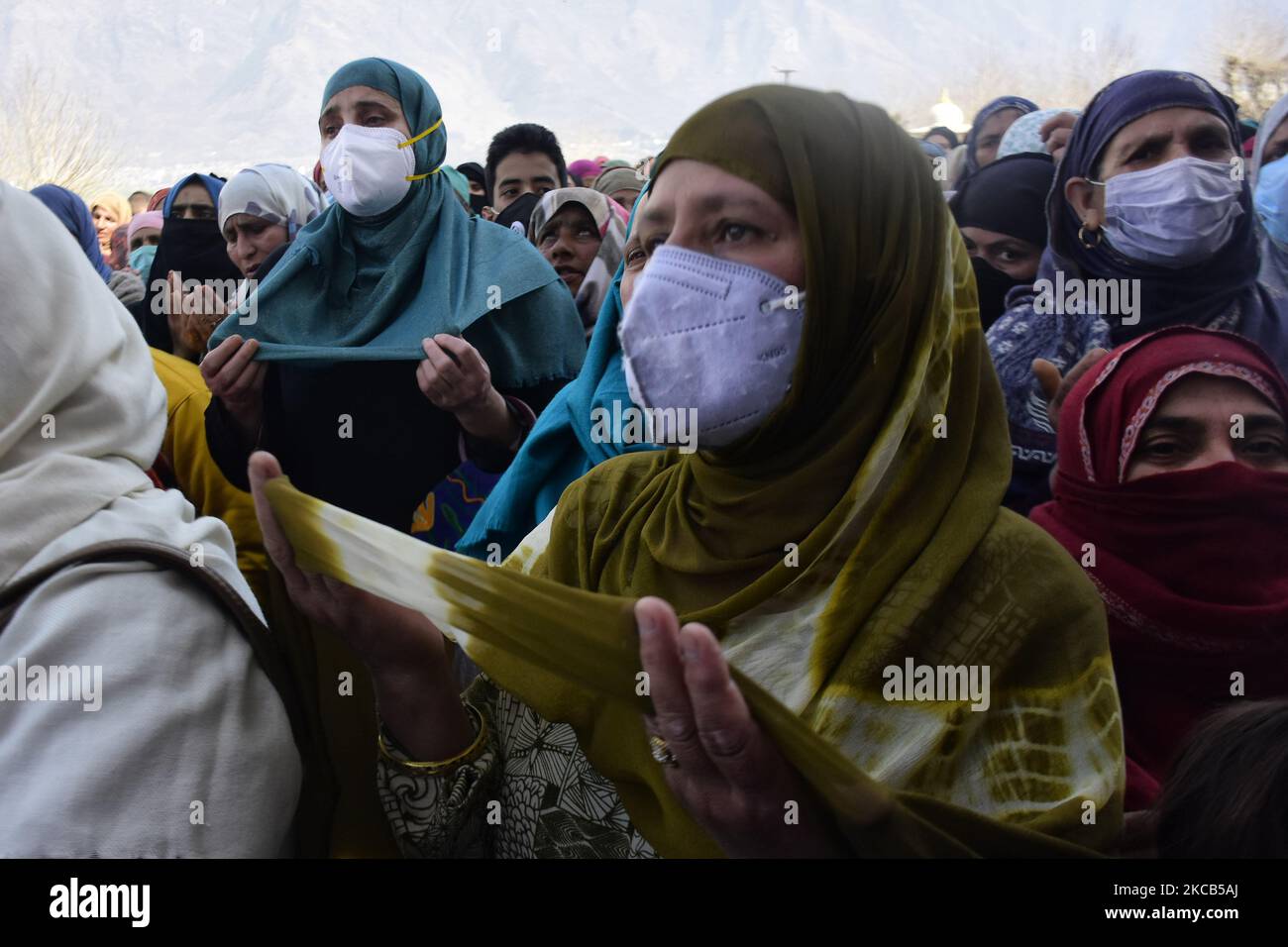 Kashmiri muslims offer prayers at Hazratbal shrine on Friday following ...